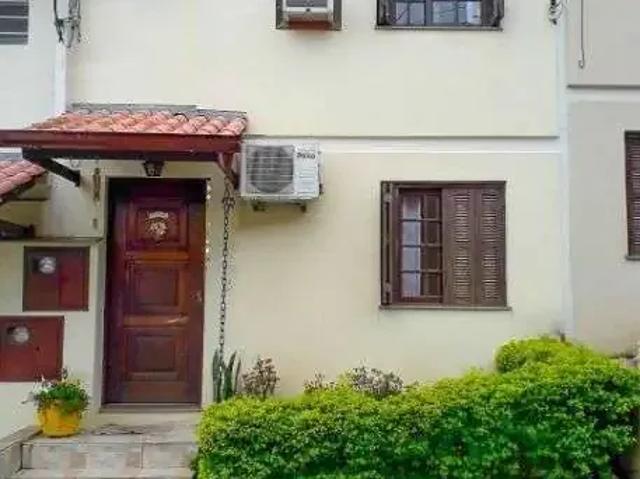 Casa / Sobrado em Condomínio para Venda em Porto Alegre/RS Vila Nova 3 Quartos
