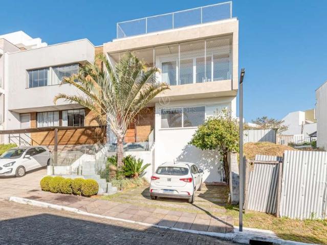Casa / Sobrado em Condomínio para Venda em Porto Alegre/RS Vila Nova 3 Quartos