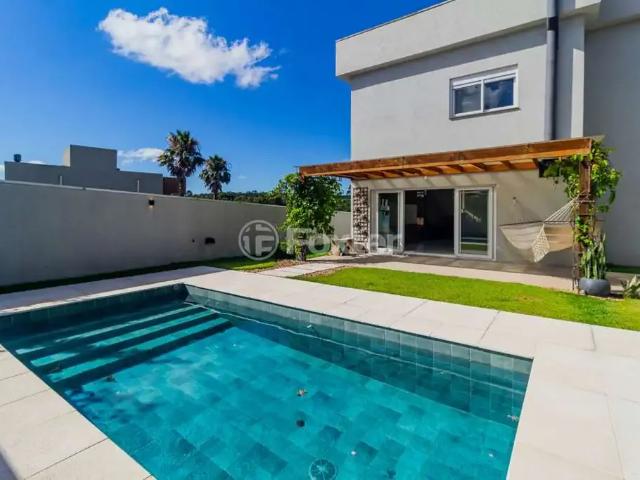 Casa / Sobrado em Condomínio para Venda em Porto Alegre/RS Vila Nova 3 Quartos