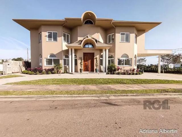 Casa / Sobrado em Condomínio para Venda em Porto Alegre/RS Vila Nova 3 Quartos