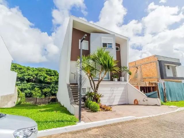 Casa / Sobrado em Condomínio para Venda em Porto Alegre/RS Vila Nova 3 Quartos