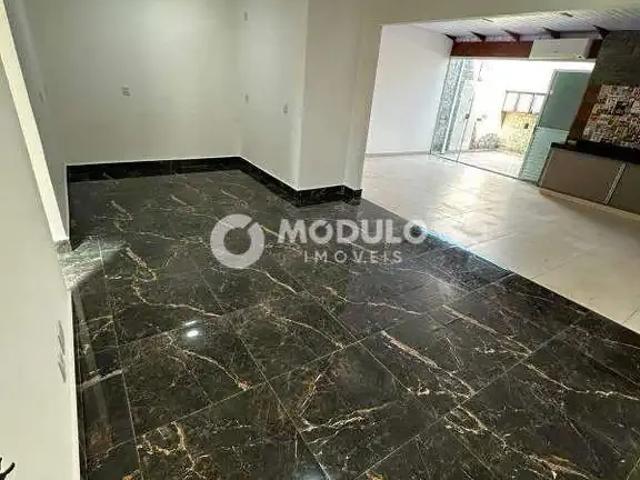 Casa / Sobrado em Condomínio para Venda em Uberlândia/MG Aclimação 3 Quartos