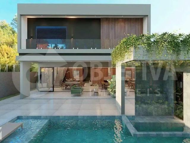 Casa / Sobrado em Condomínio para Venda em Uberlândia/MG Gávea 4 Quartos