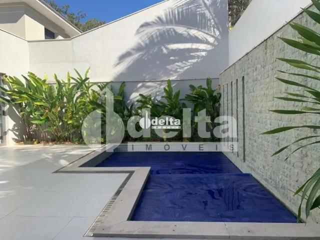 Casa / Sobrado em Condomínio para Venda em Uberlândia/MG Jardim Karaíba 4 Quartos