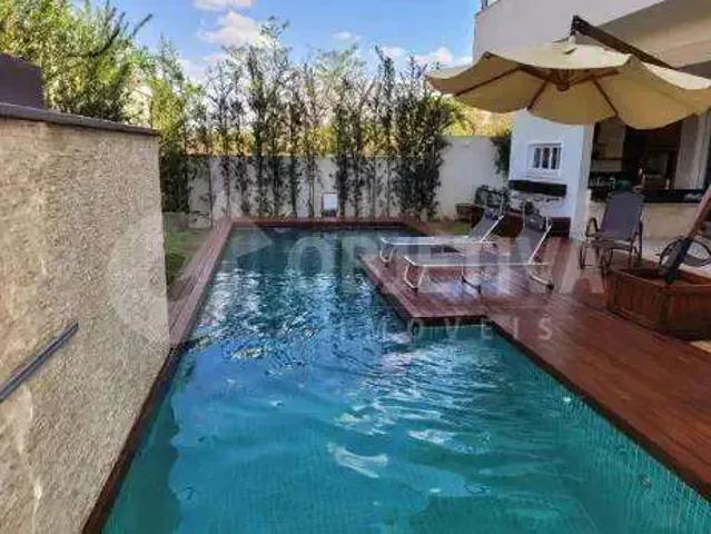 Casa / Sobrado em Condomínio para Venda em Uberlândia/MG Jardins Gênova 4 Quartos