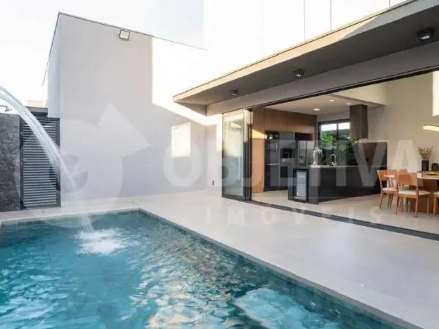 Casa / Sobrado em Condomínio para Venda em Uberlândia/MG Laranjeiras 4 Quartos