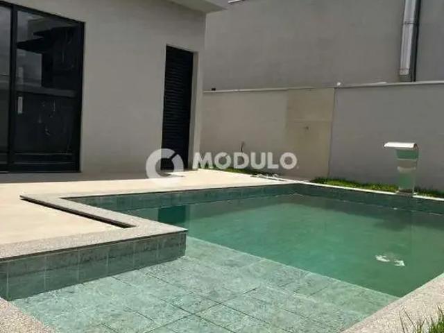 Casa / Sobrado em Condomínio para Venda em Uberlândia/MG Laranjeiras 3 Quartos
