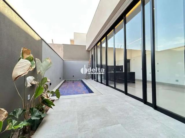 Casa / Sobrado em Condomínio para Venda em Uberlândia/MG Laranjeiras 3 Quartos