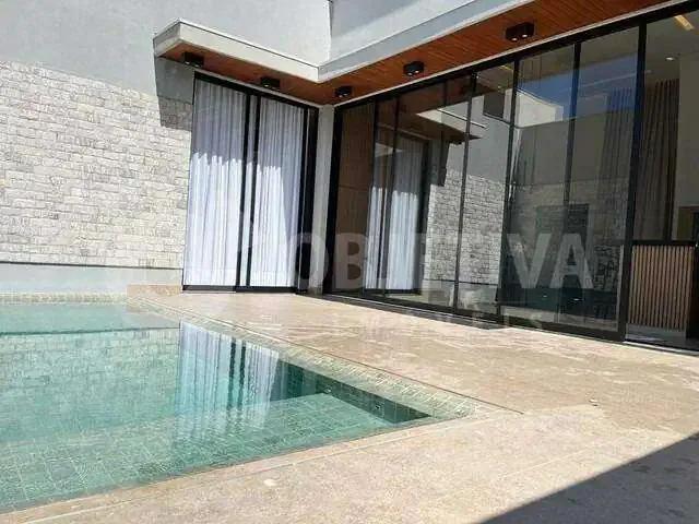 Casa / Sobrado em Condomínio para Venda em Uberlândia/MG Laranjeiras 3 Quartos