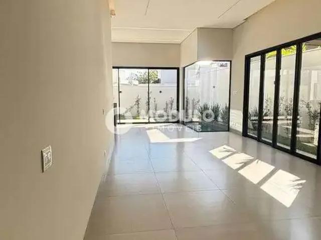 Casa / Sobrado em Condomínio para Venda em Uberlândia/MG Laranjeiras 3 Quartos