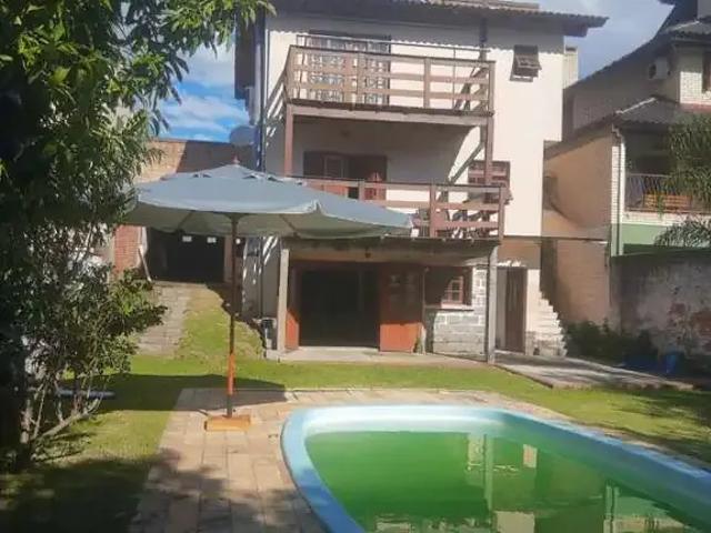 Casa / Sobrado em Condomínio para Venda em Viamão/RS Cantegril 3 Quartos