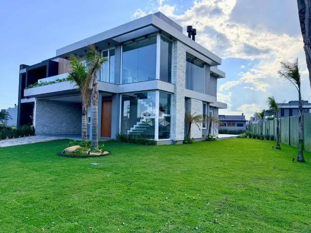 Casa / Sobrado em Condomínio para Venda em Xangri Lá/RS Centro 4 Quartos