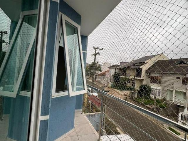 Casa sobrado em Gravatai de 3 dormitórios e 2 vagas