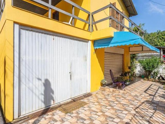 Casa sobrado em Viamão com loja e apartamento