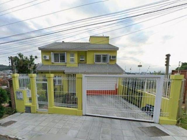 Casa sobrado no bairro Jardim Sabará de 3 dormitórios e 4 vagas