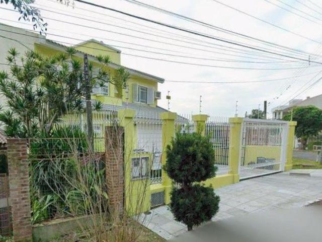 Casa sobrado no bairro Jardim Sabará de 3 dormitórios e 4 vagas
