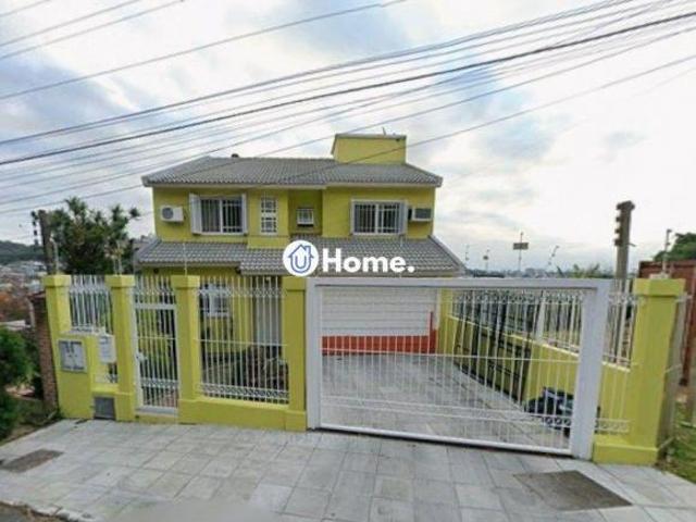 Casa sobrado no bairro Jardim Sabará de 3 dormitórios e 4 vagas