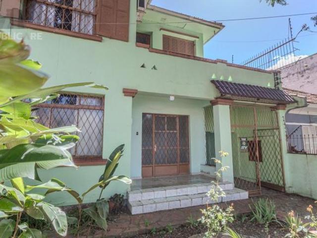 Casa sobrado no Partenon com 5 dormitórios e 4 vagas