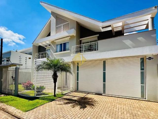 Casa / Sobrado para Venda em Toledo/PR Centro 4 Quartos