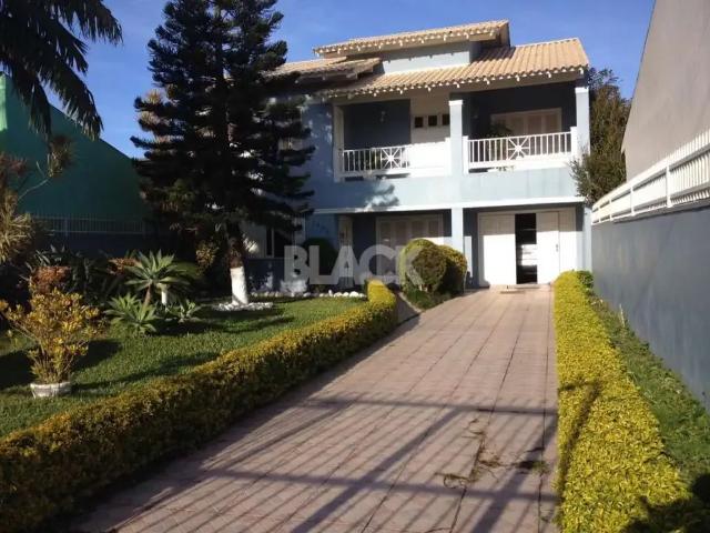 Casa / Sobrado para Venda em Torres/RS Igra Sul 4 Quartos