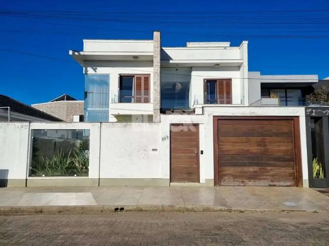 Casa / Sobrado para Venda em Torres/RS Morada das Palmeiras 4 Quartos