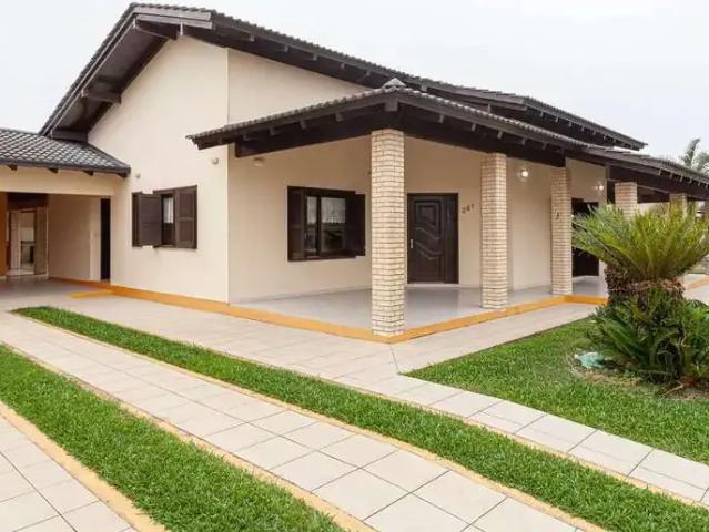 Casa / Sobrado para Venda em Torres/RS Paraíso Distrito 4 Quartos