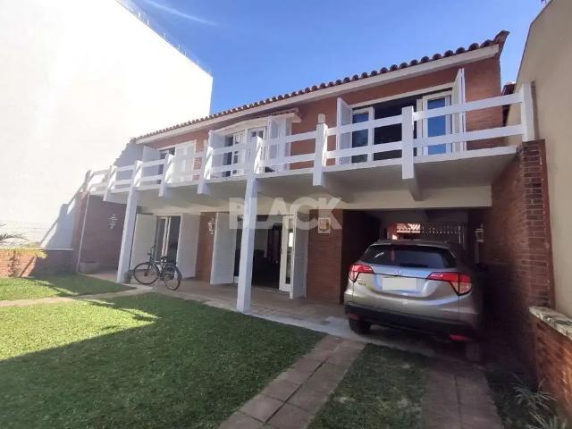 Casa / Sobrado para Venda em Torres/RS Praia Grande 4 Quartos