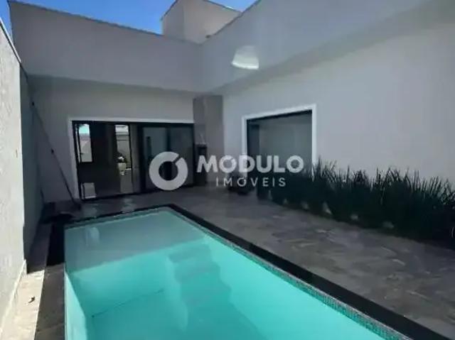 Casa / Sobrado para Venda em Uberlândia/MG Novo Mundo 3 Quartos