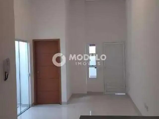 Casa / Sobrado para Venda em Uberlândia/MG Novo Mundo 3 Quartos