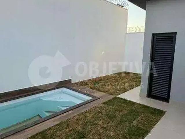 Casa / Sobrado para Venda em Uberlândia/MG Novo Mundo 3 Quartos