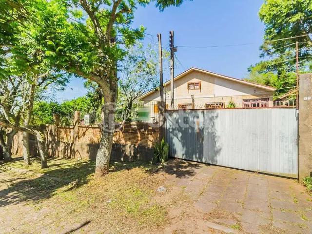 Casa / Sobrado para Venda em Viamão/RS Vila Augusta 3 Quartos