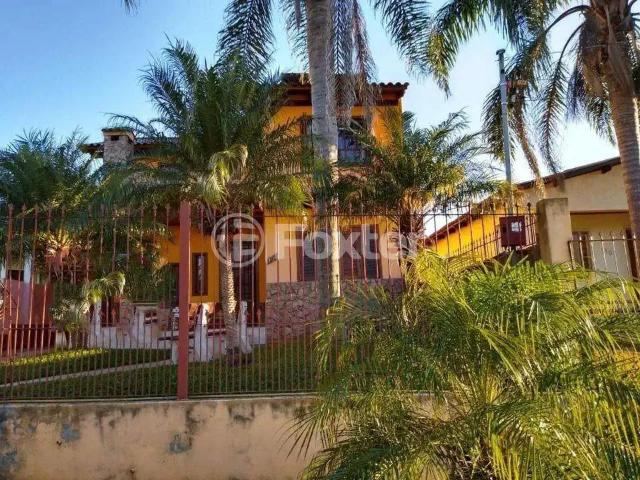 Casa / Sobrado para Venda em Viamão/RS Cocão 4 Quartos