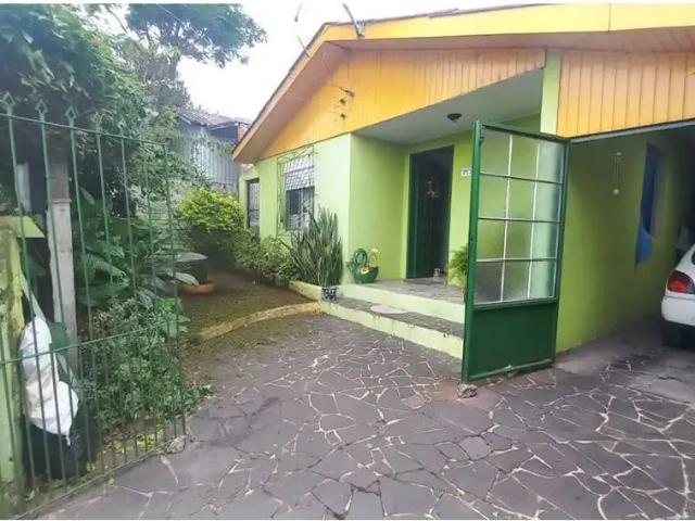 Casa / Sobrado para Venda em Alvorada/RS Aparecida 3 Quartos