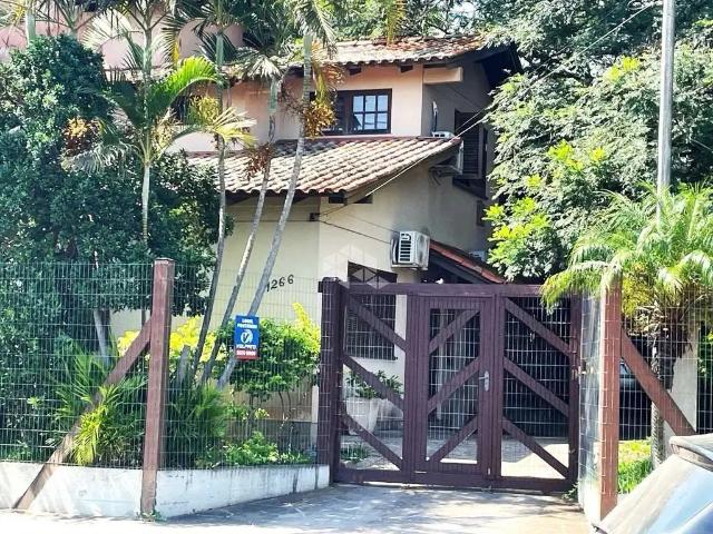 Casa / Sobrado para Venda em Alvorada/RS Aparecida 3 Quartos