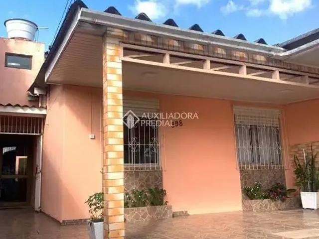 Casa / Sobrado para Venda em Alvorada/RS Jardim Algarve 3 Quartos