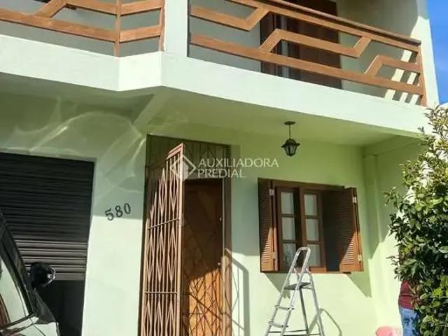 Casa / Sobrado para Venda em Alvorada/RS Jardim Algarve 3 Quartos