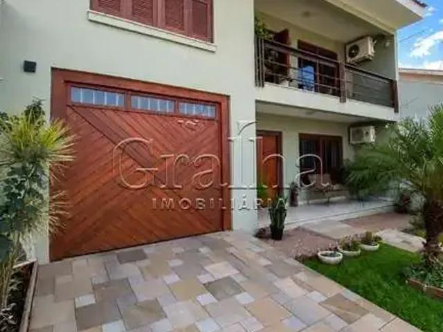 Casa / Sobrado para Venda em Alvorada/RS Jardim Algarve 3 Quartos