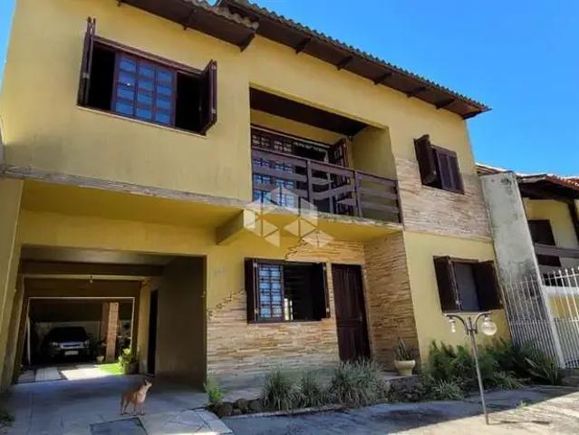 Casa / Sobrado para Venda em Alvorada/RS Jardim Algarve 3 Quartos