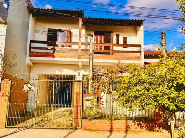 Casa / Sobrado para Venda em Alvorada/RS Jardim Algarve 3 Quartos