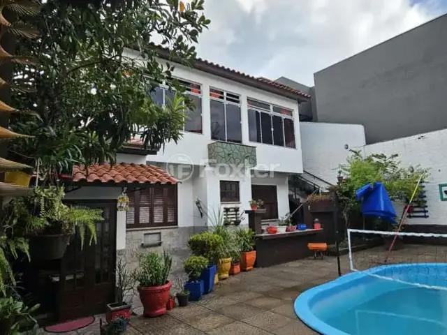 Casa / Sobrado para Venda em Alvorada/RS Jardim Algarve 3 Quartos