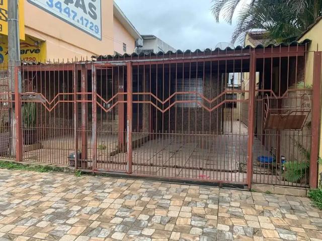 Casa / Sobrado para Venda em Alvorada/RS Jardim Algarve 3 Quartos