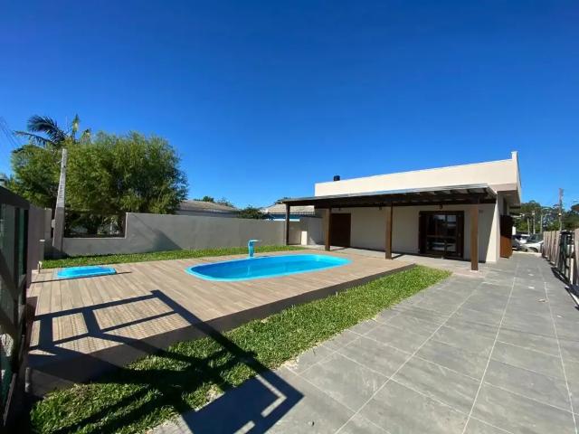 Casa / Sobrado para Venda em Arroio do Sal/RS Centro 2 Quartos