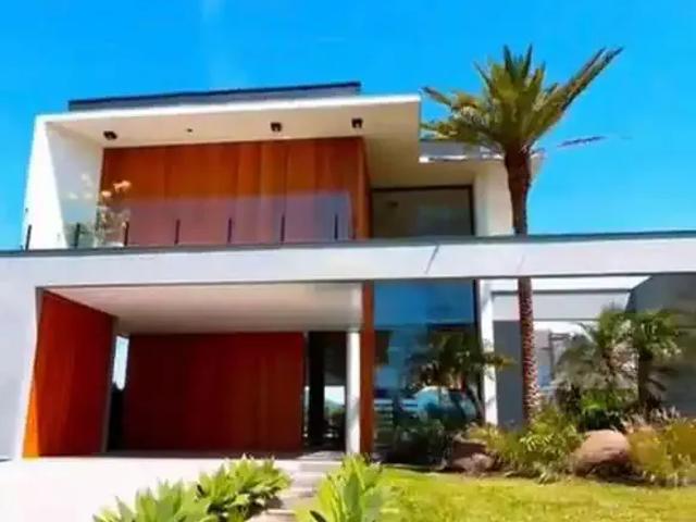 Casa / Sobrado para Venda em Arroio do Sal/RS Centro 3 Quartos