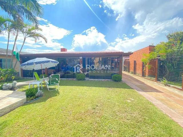 Casa / Sobrado para Venda em Arroio do Sal/RS Centro 4 Quartos