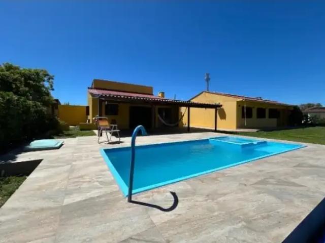 Casa / Sobrado para Venda em Balneário Pinhal/RS Centro 4 Quartos