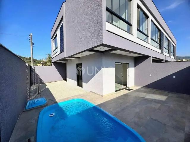 Casa / Sobrado para Venda em Camboriú/SC Areias 3 Quartos