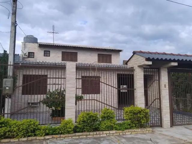 Casa / Sobrado para Venda em Canoas/RS Estância Velha 4 Quartos