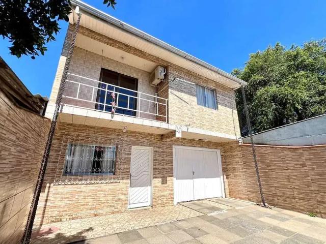 Casa / Sobrado para Venda em Canoas/RS Estância Velha 4 Quartos