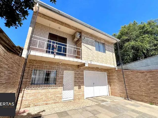 Casa / Sobrado para Venda em Canoas/RS Estância Velha 4 Quartos