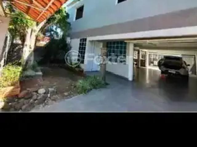 Casa / Sobrado para Venda em Canoas/RS Estância Velha 4 Quartos